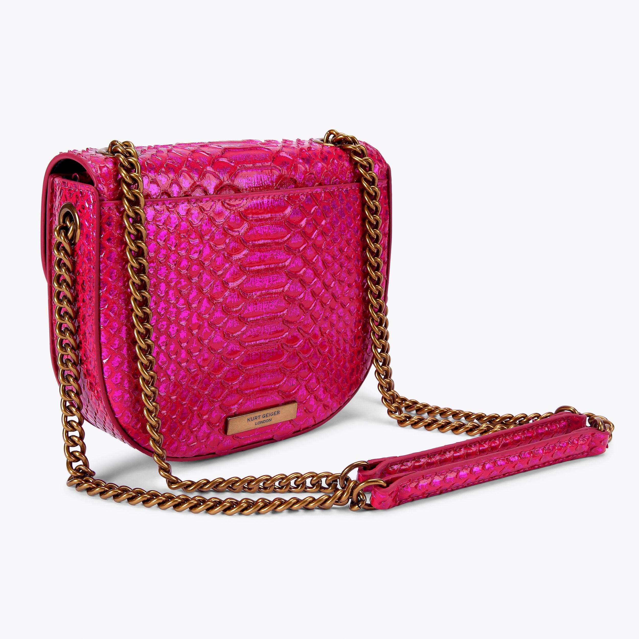 CHELSEA SADDLE BAG Metallic Fuchsia Cross Body Bag by KURT GEIGER LONDON
