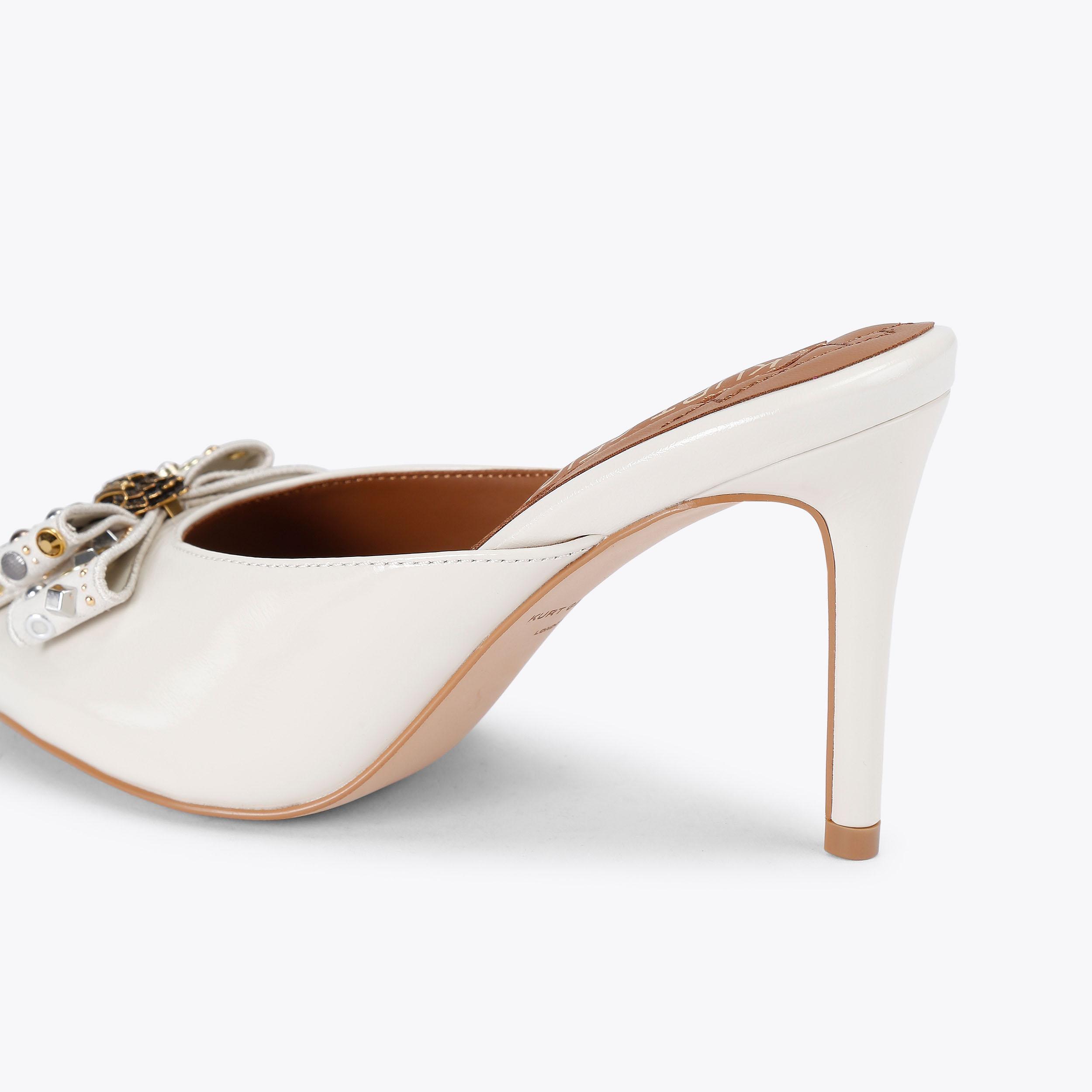 BELGRAVIA STUD BOW MULE Bone Patent Bow Mule Heels by KURT GEIGER LONDON