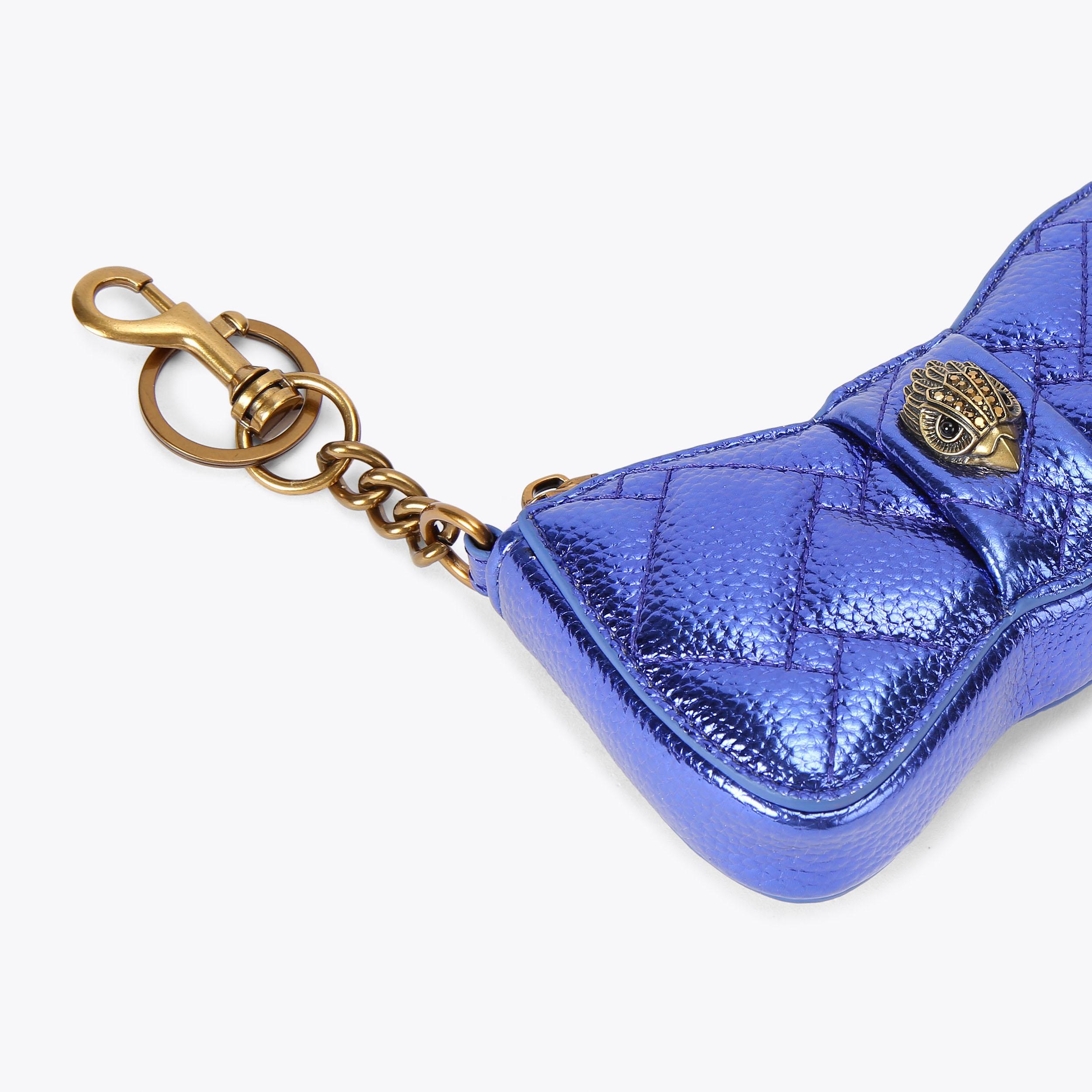 KENSINGTON BOW CHARM Blue Pebble Grain Bow Charm by KURT GEIGER LONDON